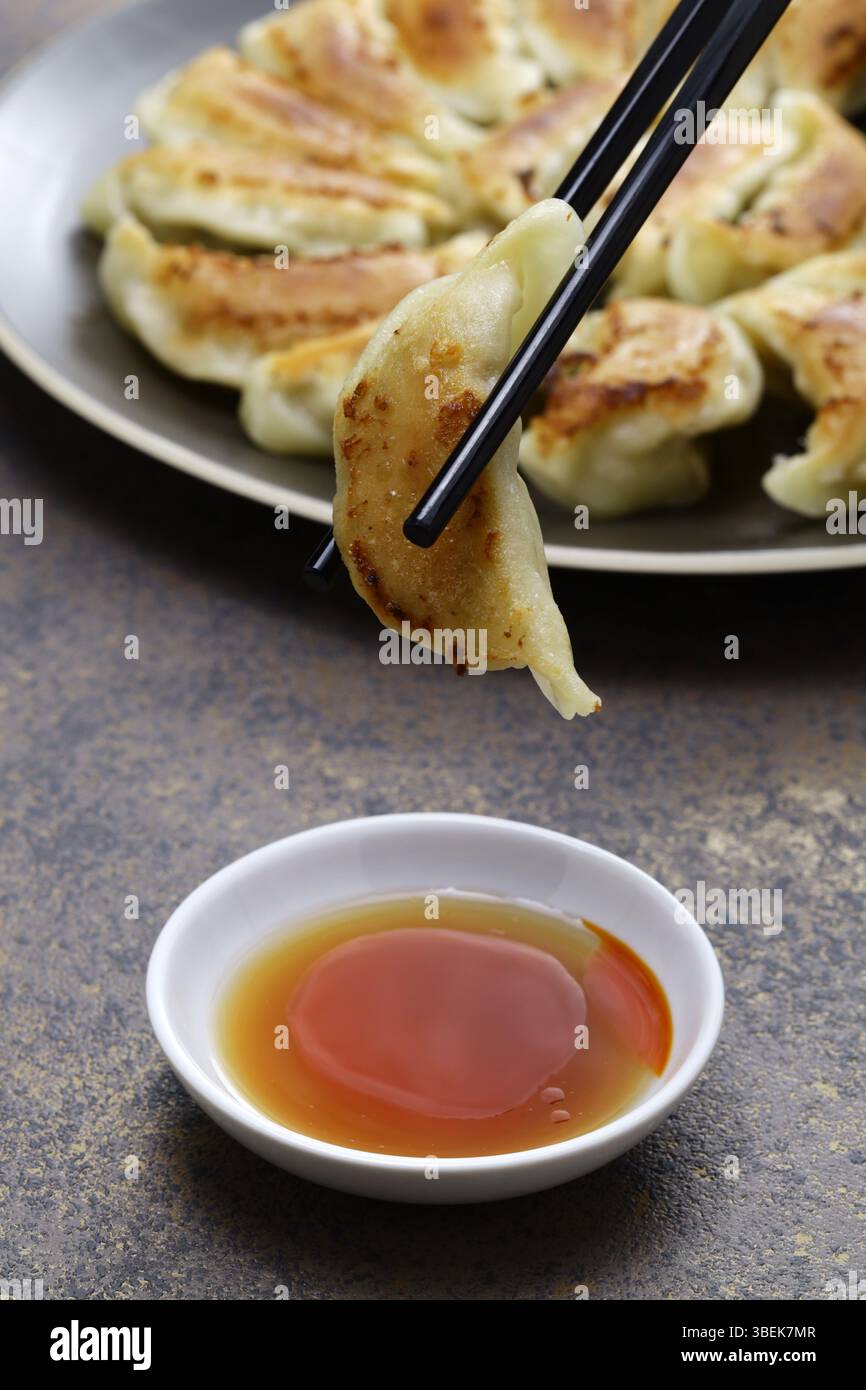 Gyoza, Japanese potstickers are mainly steamed in frying pan, then ...