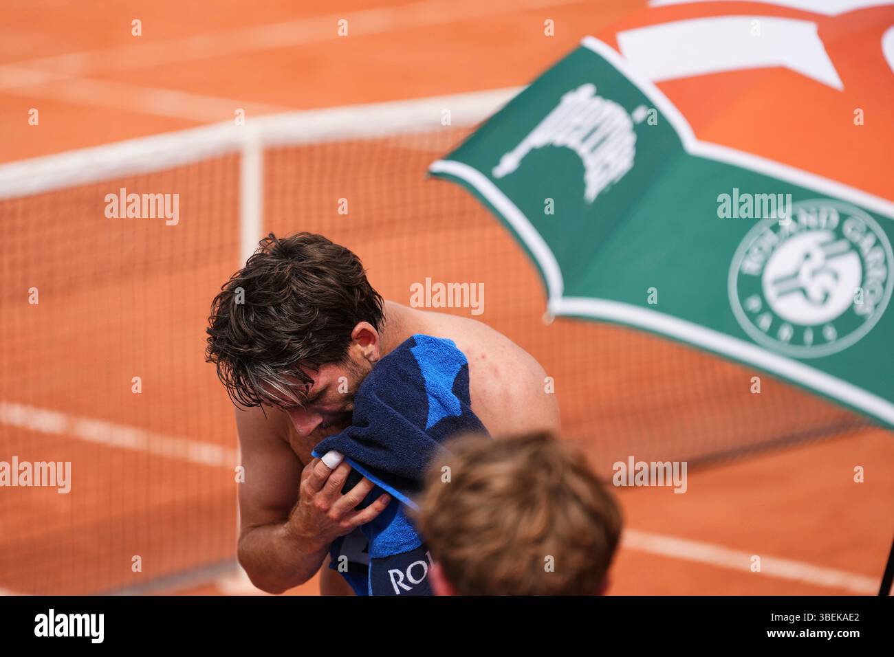 Britain's Cameron Norrie wipes his sweat as he plays Argentina's ...