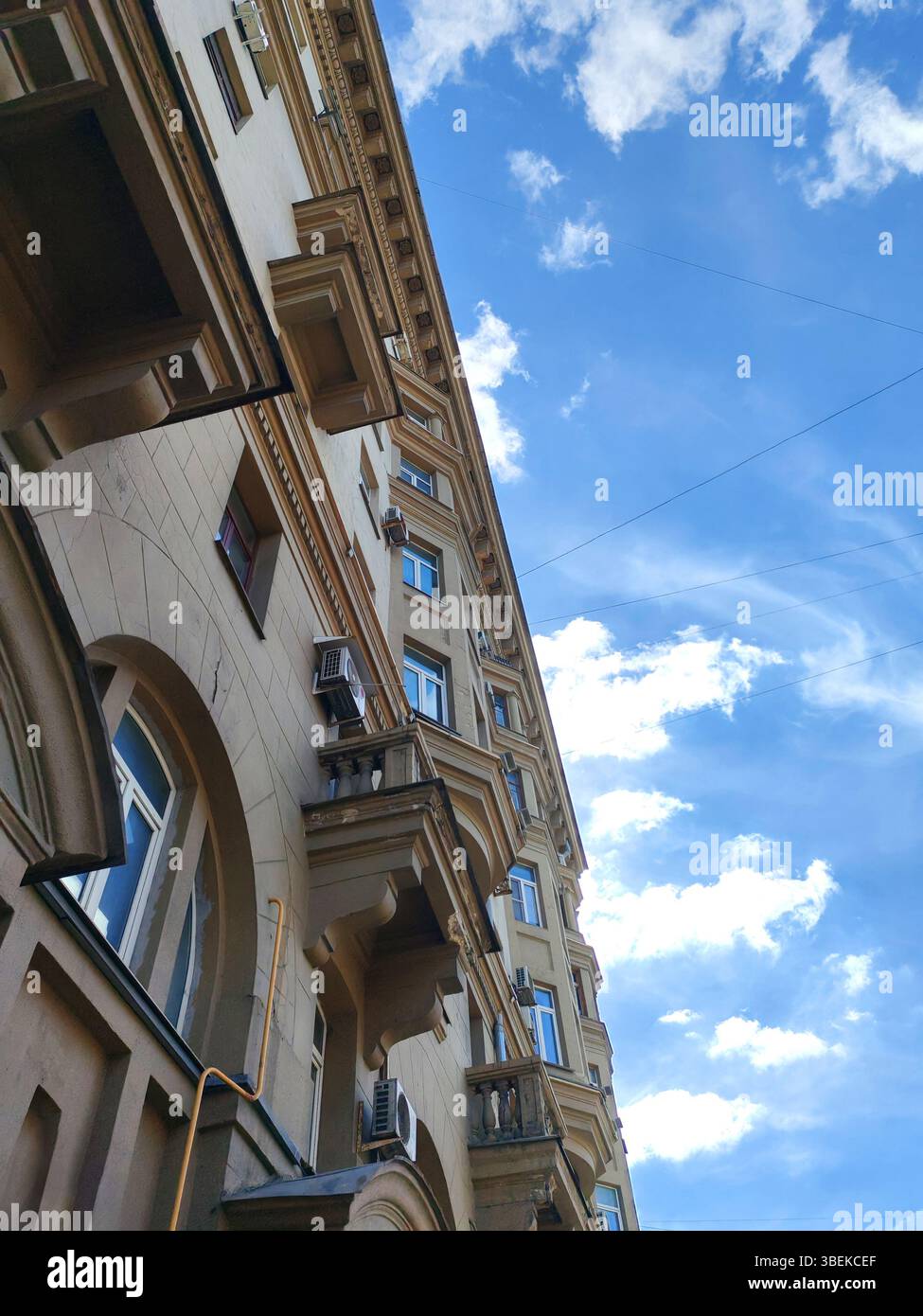 A historic building with ornate details overshadowed by visible damage ...