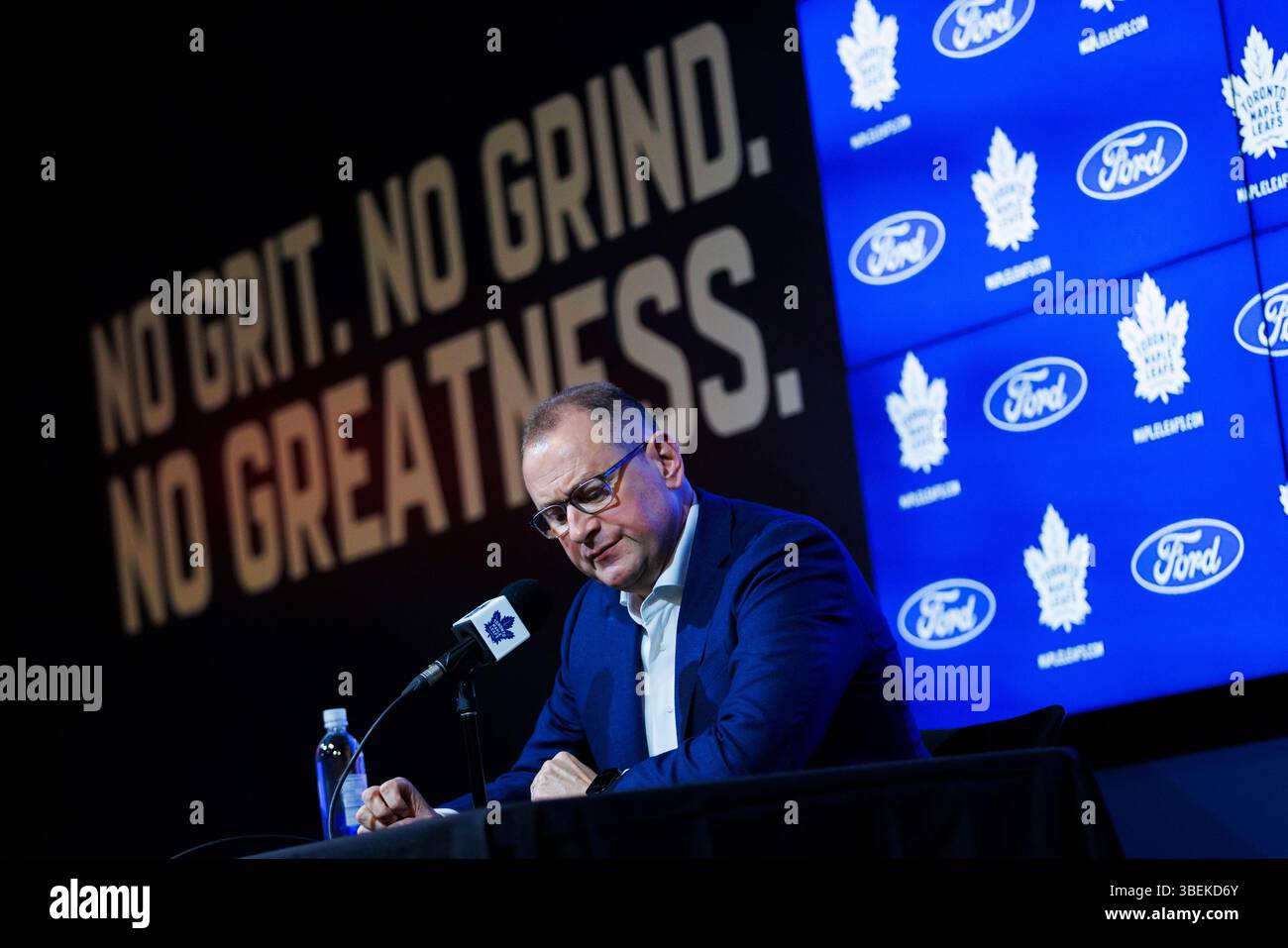 Toronto Maple Leafs general manager Brad Treliving holds an NHL hockey ...