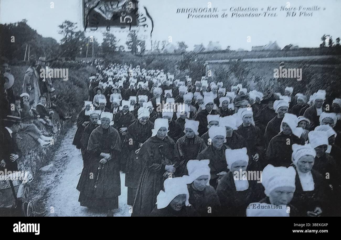This early 20th-century photograph captures a procession of women in ...