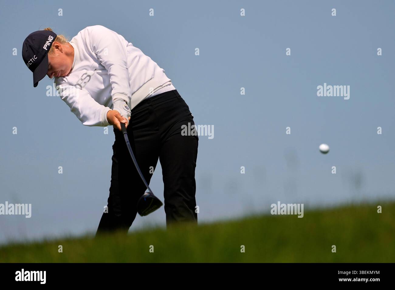 Celine Borge, of Norway, hits on the eighth hole during the first round ...
