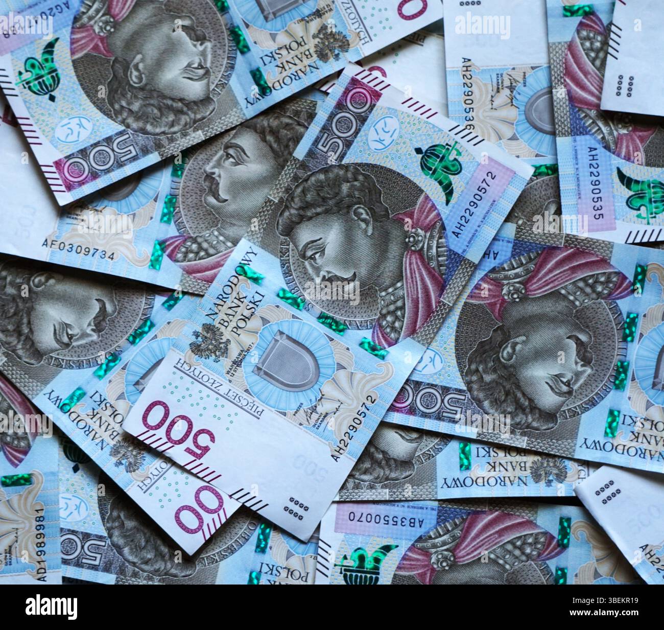 Close-up of scattered 500 zloty banknotes, showing Polish currency and ...