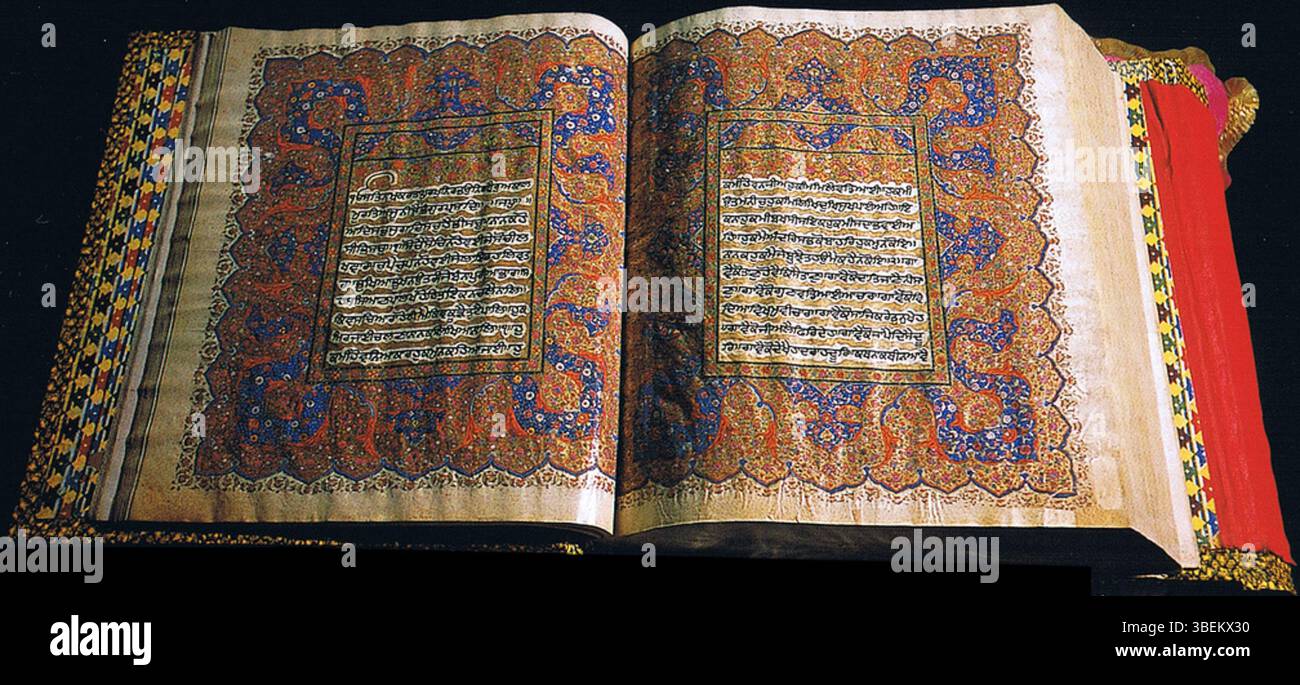 This Guru Granth Sahib manuscript features a grand folio with intricate ...