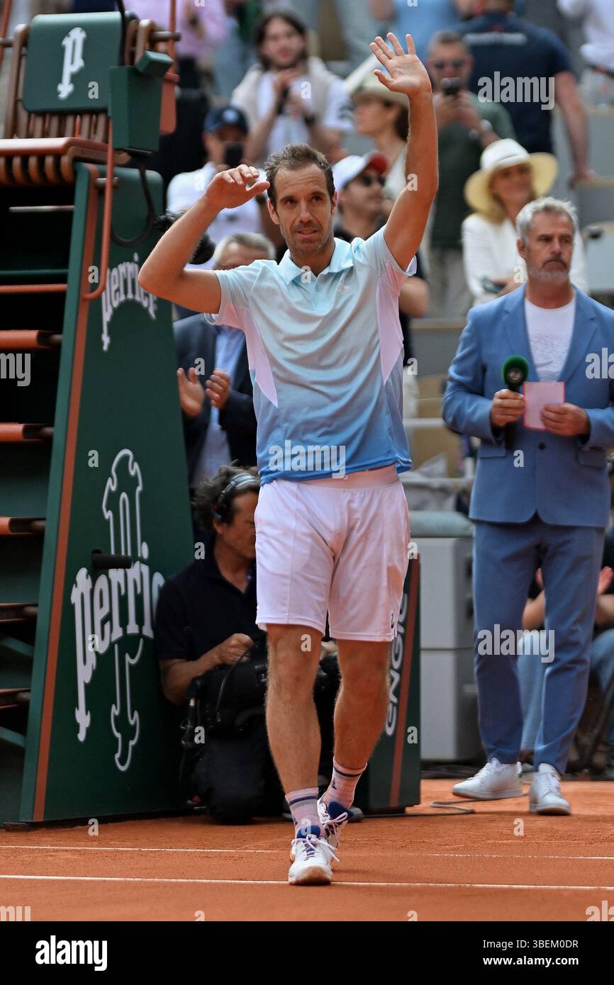 Richard Gasquet of France holds his commemorative trophy, given to him ...