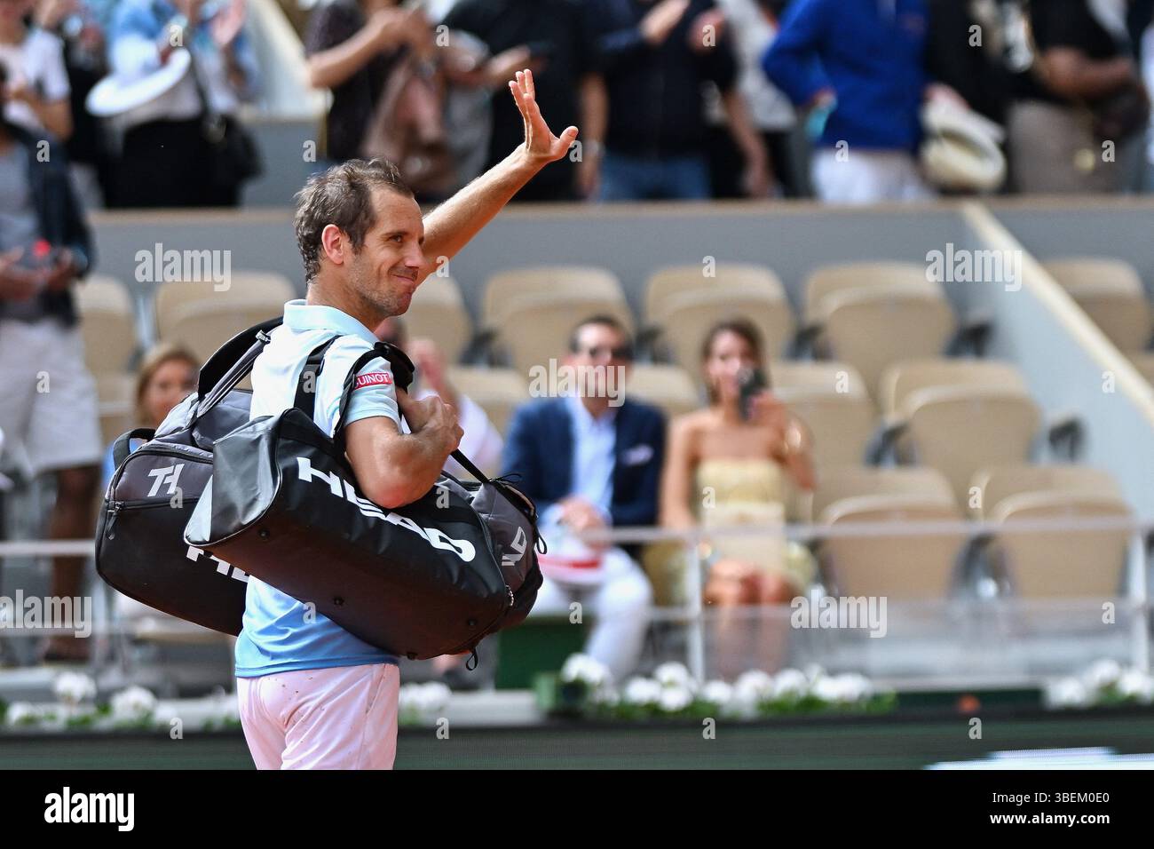 Richard Gasquet of France holds his commemorative trophy, given to him ...