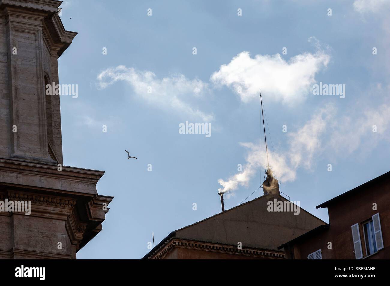 Vatican City, 8 May, 2025. White smoke emerges from the chimney atop ...