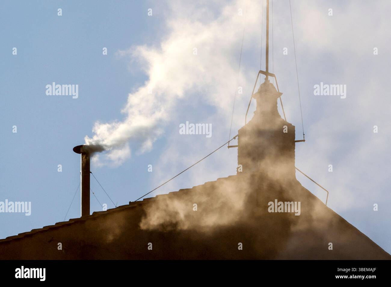 Vatican City, 8 May, 2025. White smoke emerges from the chimney atop ...