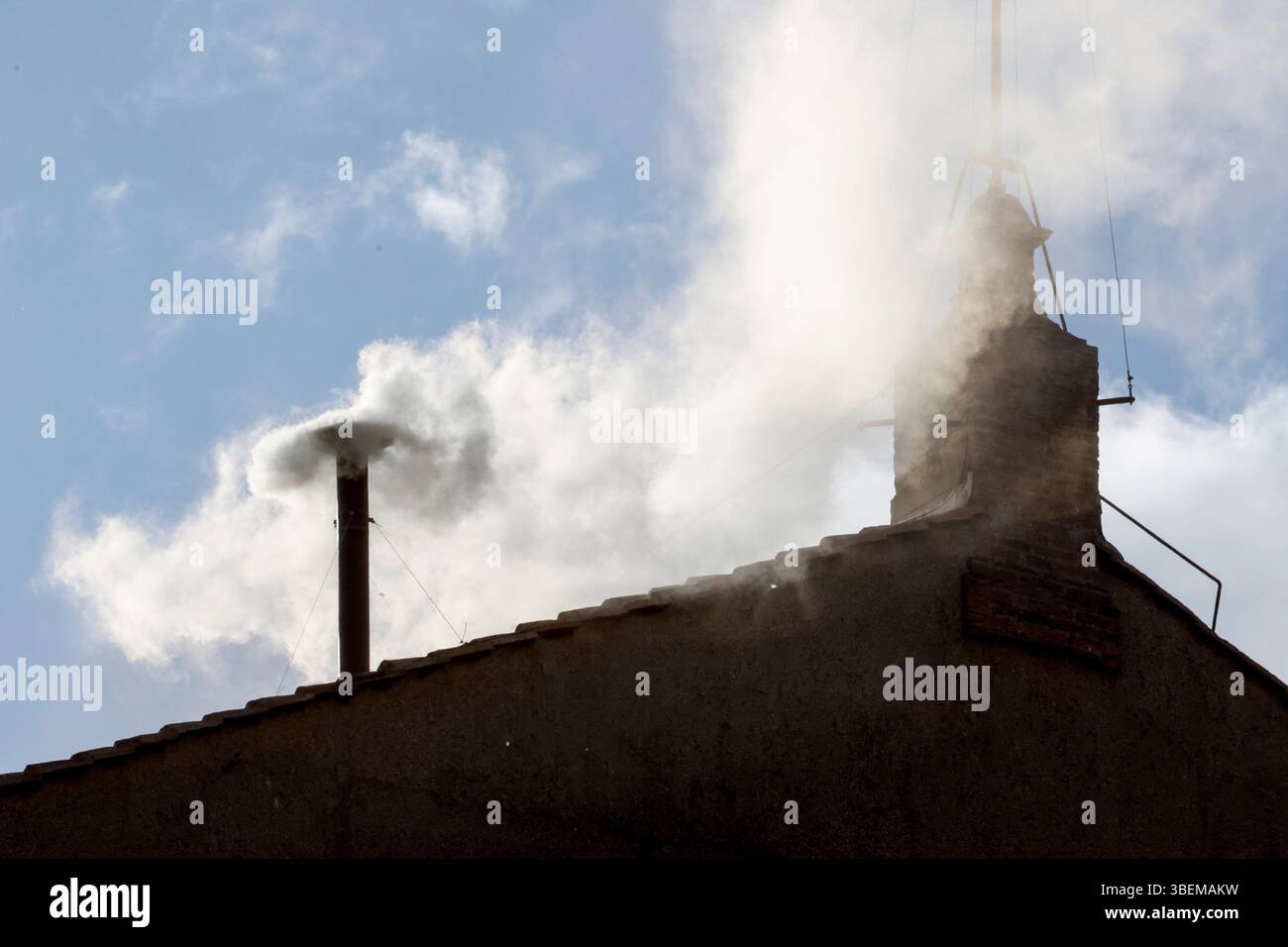Vatican City, 8 May, 2025. White smoke emerges from the chimney atop ...