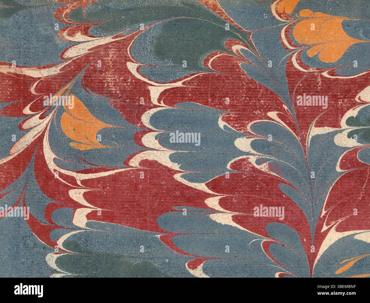 Close-up view of marbled paper used in bookbinding from England, dated ...