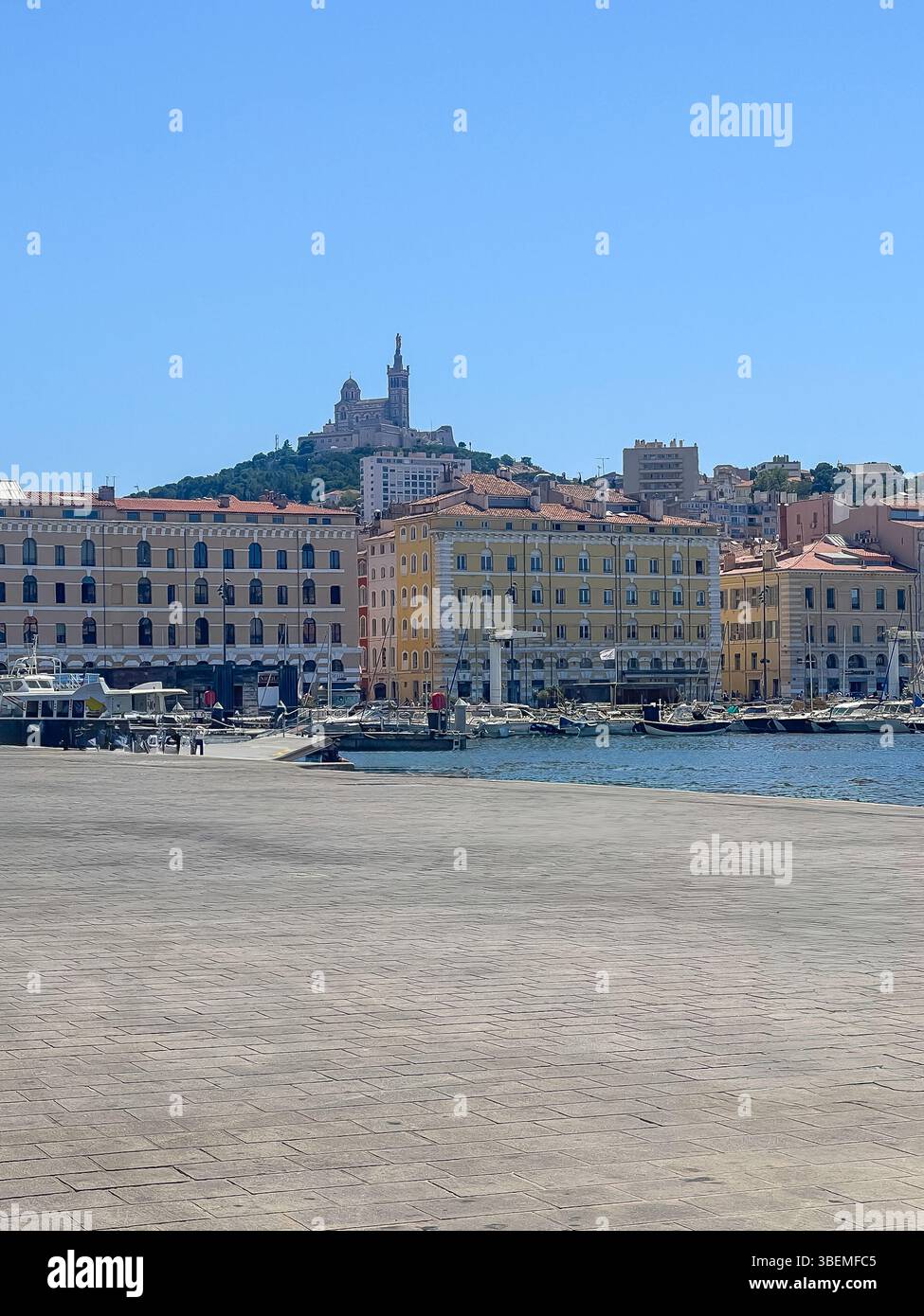Marseille, France - July 10, 2024: Downtown scenery. Basilica ...