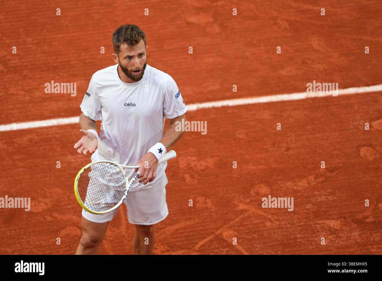 France's Corentin Moutet reads as he plays Serbia's Novak Djokovic ...