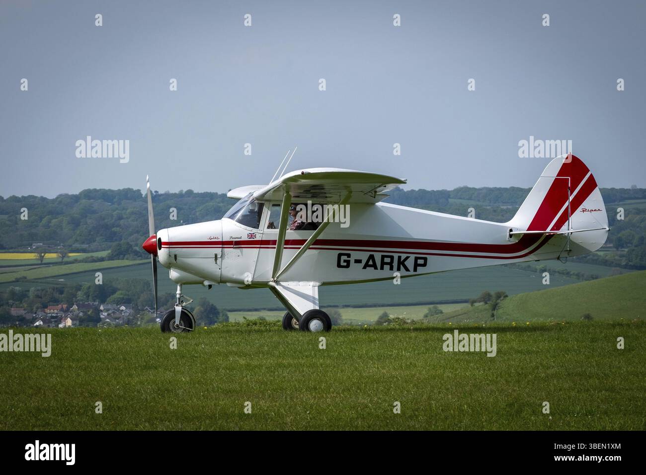 A Piper PA22 Colt light aircraft, G-ARKP, landing at Compton Abbas ...