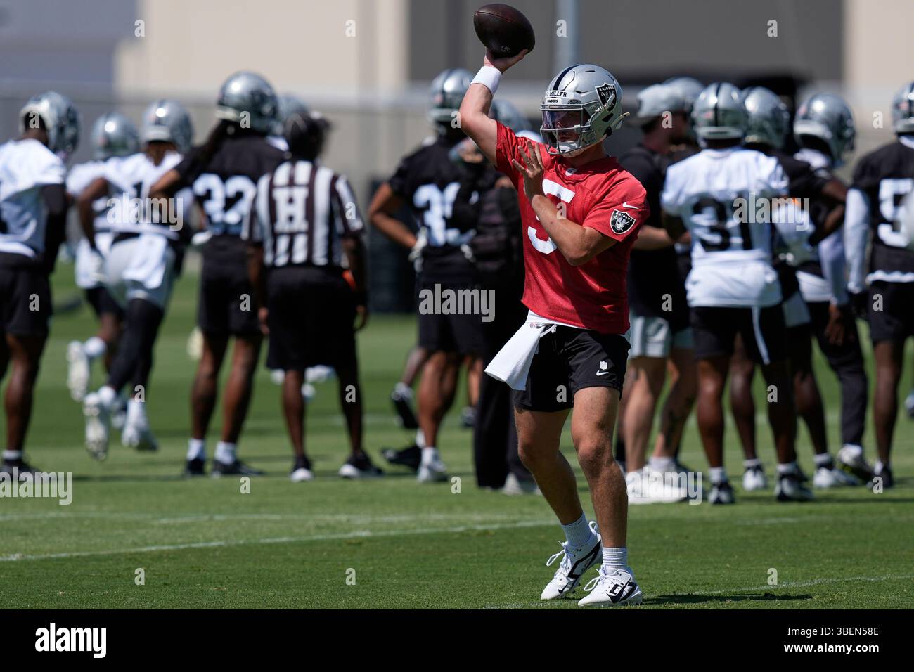 Las Vegas Raiders quarterback Cam Miller throws during an NFL football ...