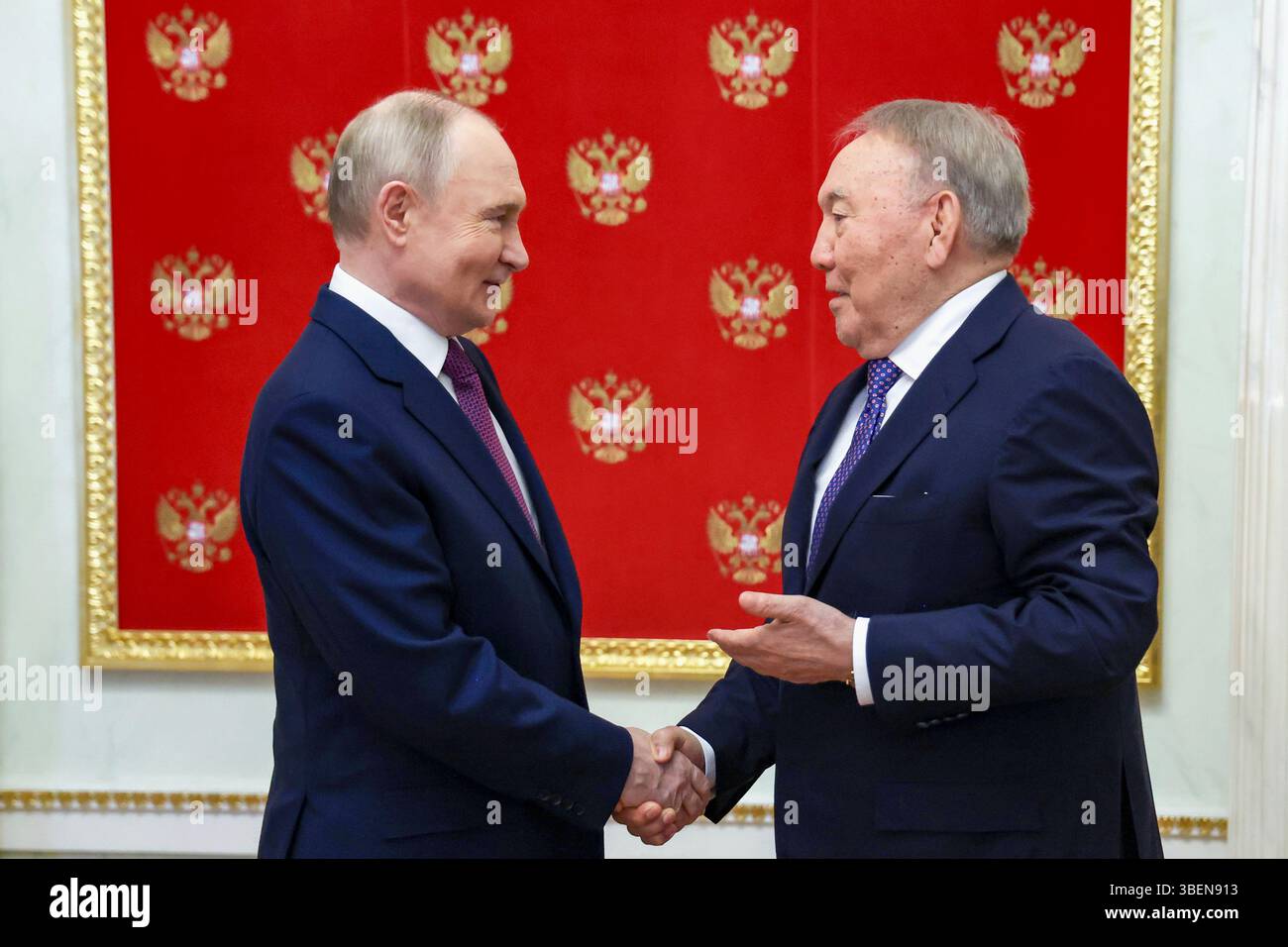 Russian President Vladimir Putin, left, and former President of Kazakhstan Nursultan Nazarbayev ...
