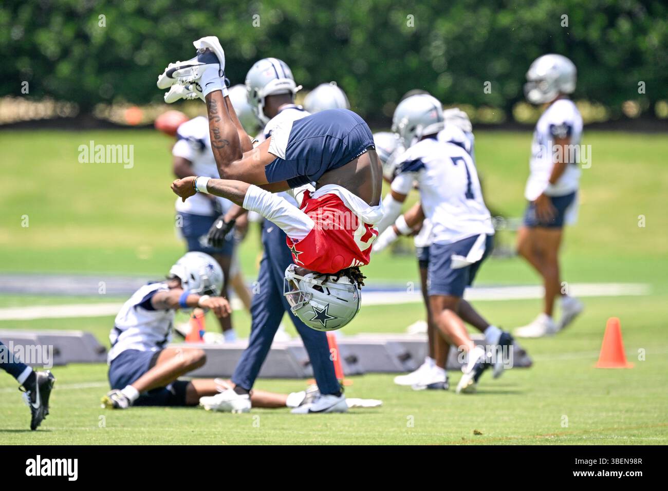 Dallas Cowboys' quarterback Joe Milton III performs a backflip during ...