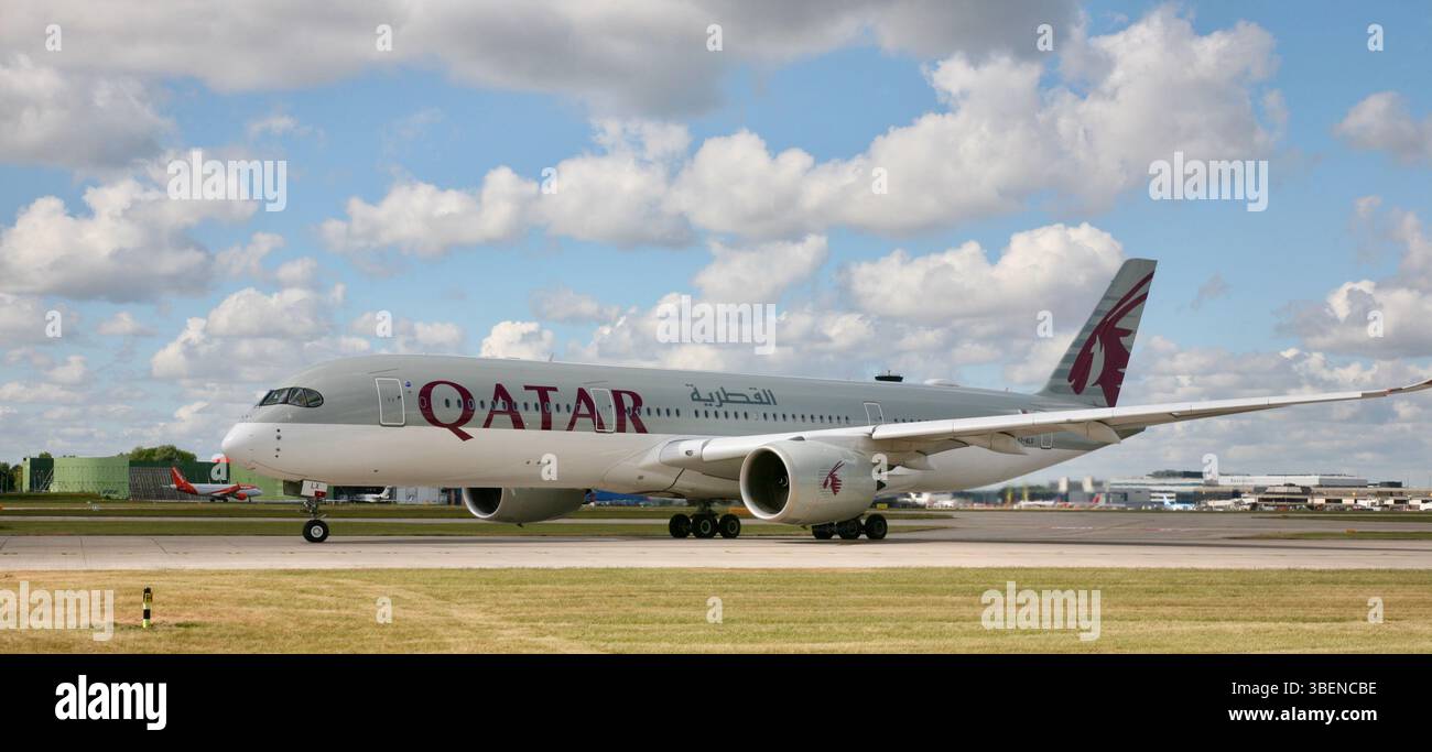 Aircraft A7-ALX, an Airbus A350-941 jet, waiting to take off from ...