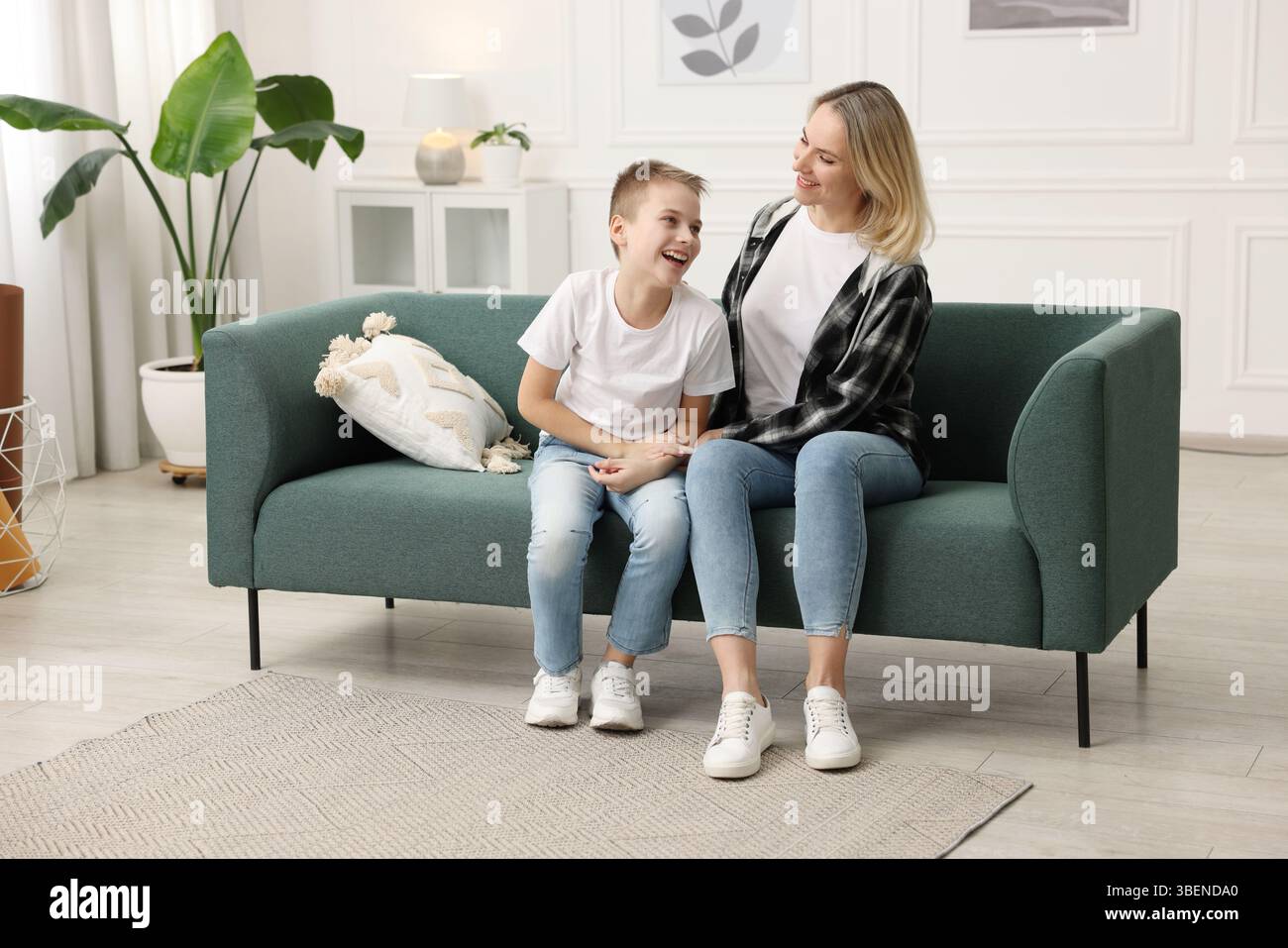 Mother and son having fun at home Stock Photo - Alamy