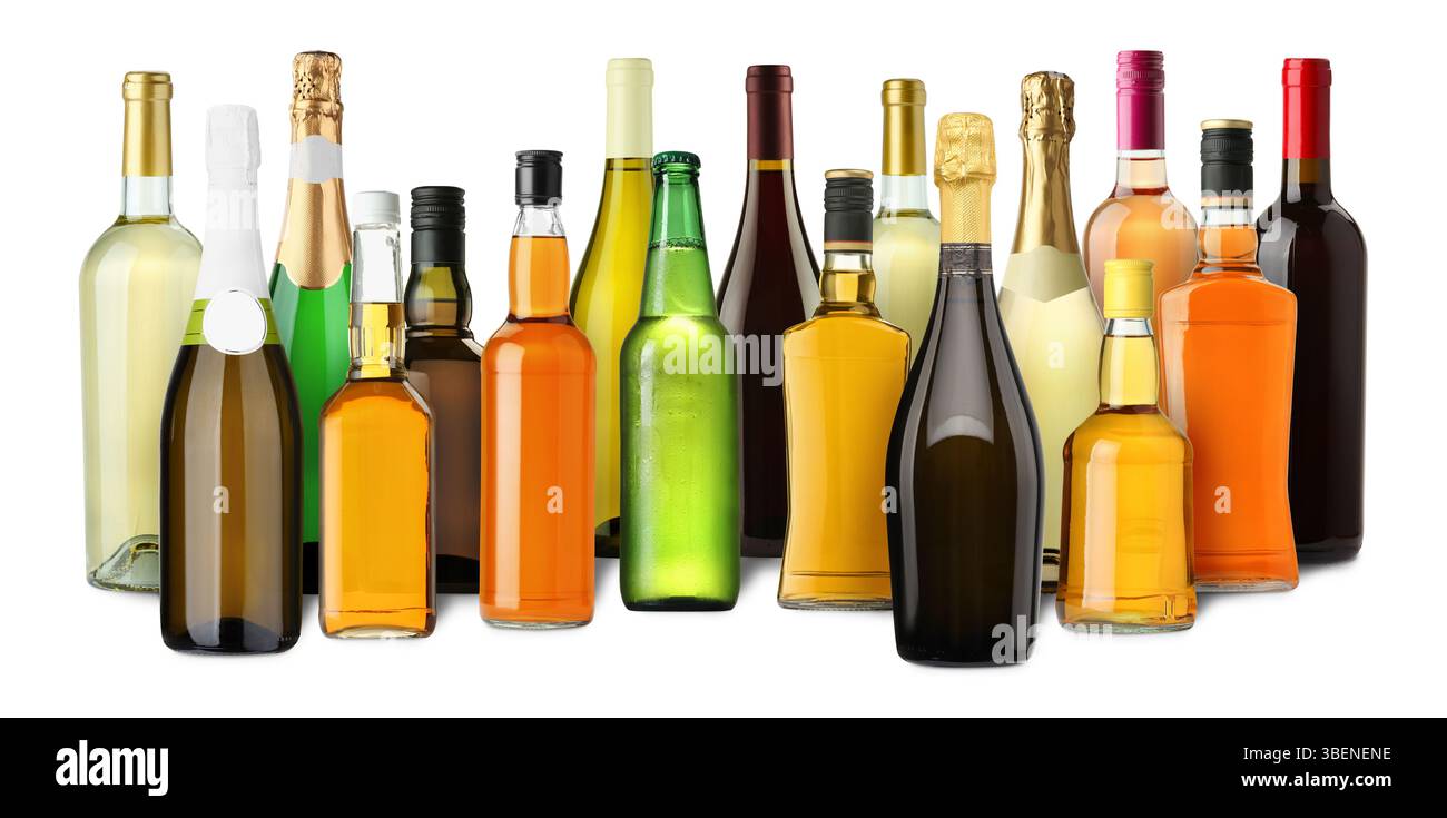 Bottles with different types of alcoholic drinks on white background ...