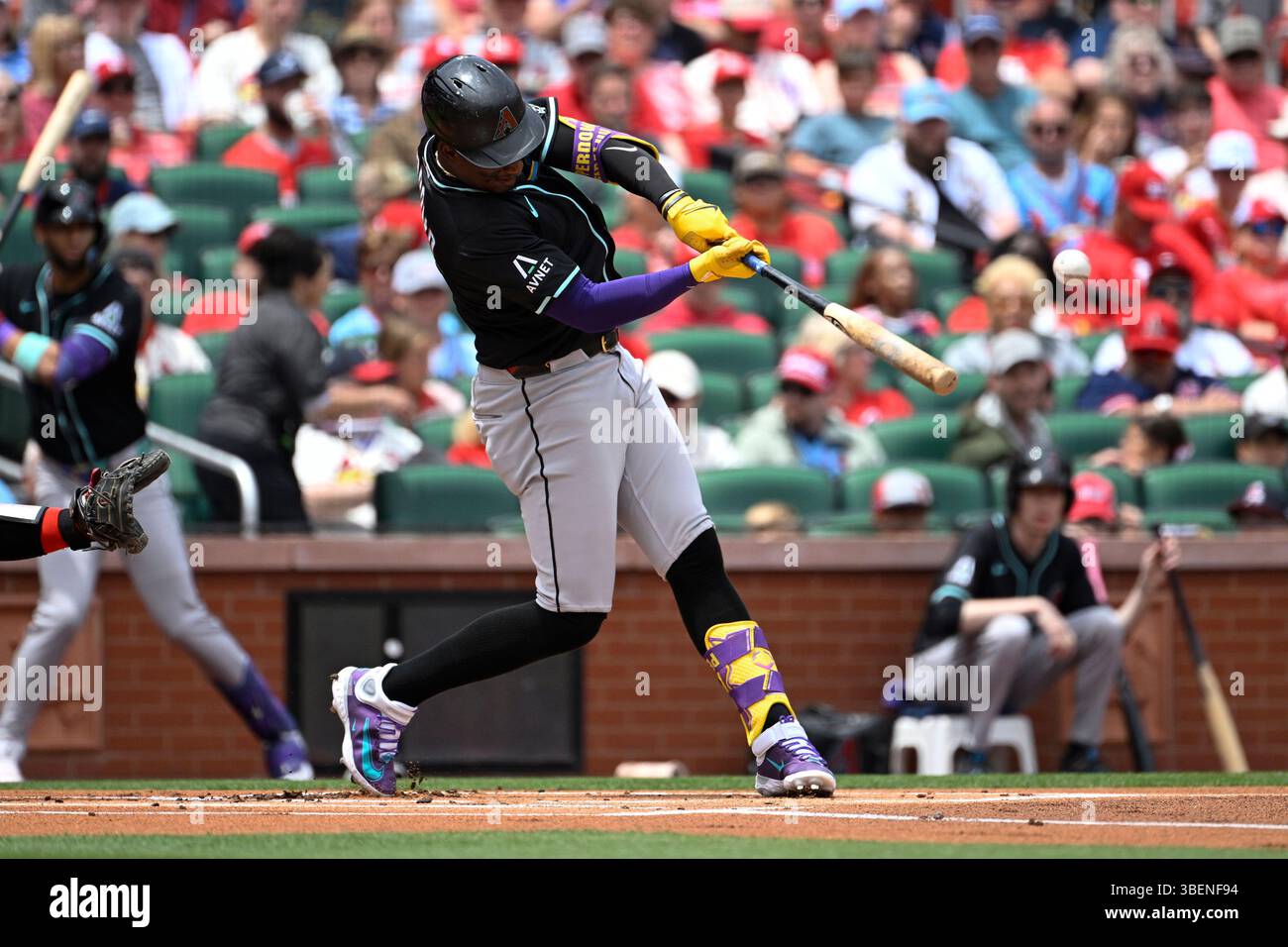 Arizona Diamondbacks' Geraldo Perdomo hits a single in the first inning ...
