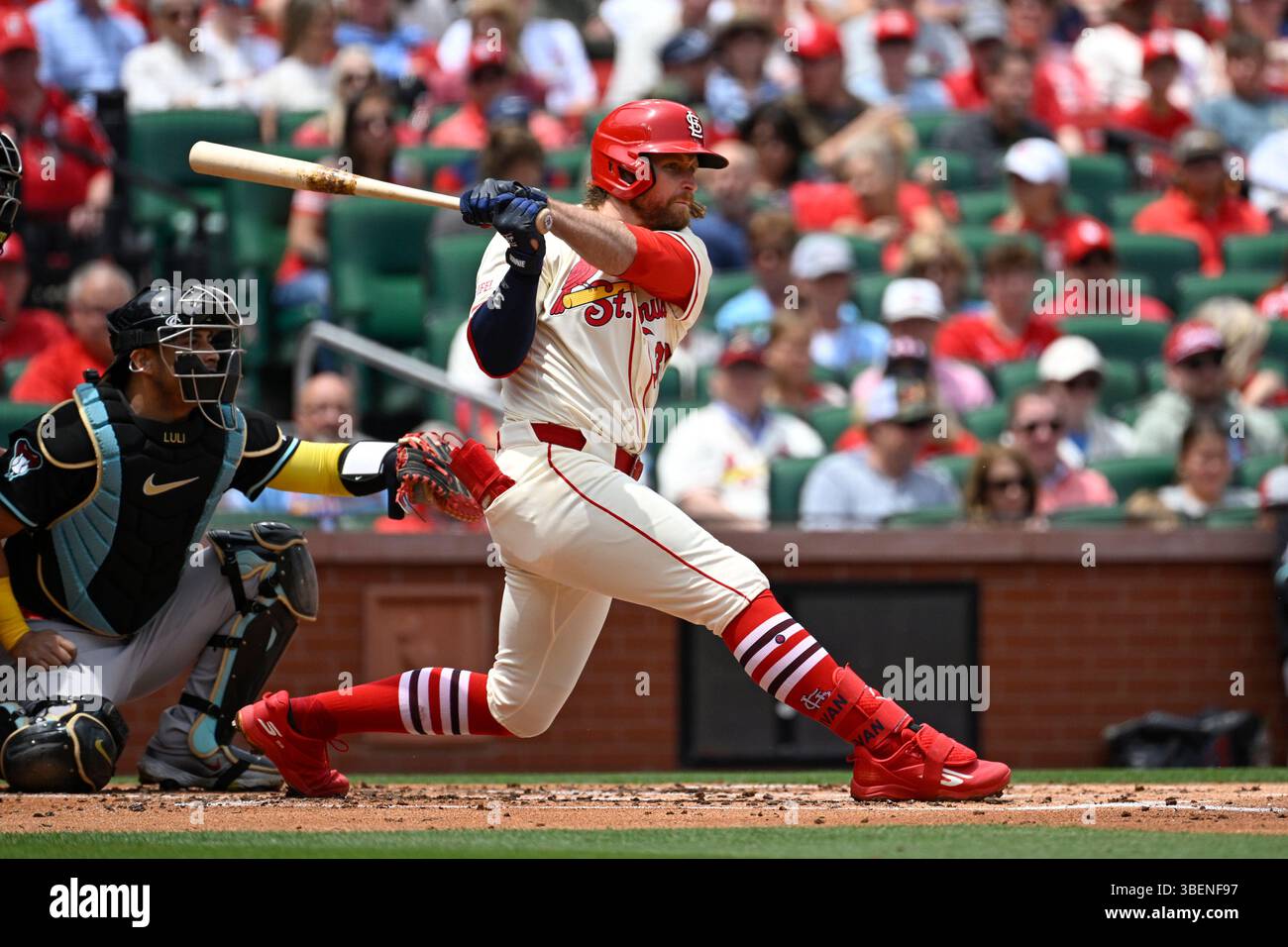 St. Louis Cardinals' Brendan Donovan hits a single in the first inning ...