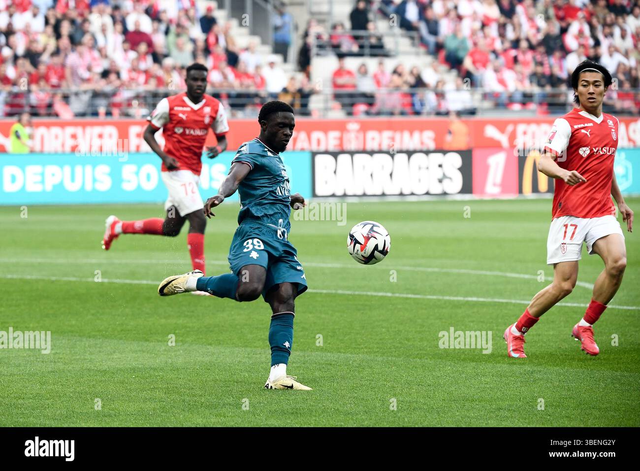 39 Koffi-Franck KOUAO (fcm) - 17 Keito NAKAMURA (sdr) during the playoffs match between Reims ...