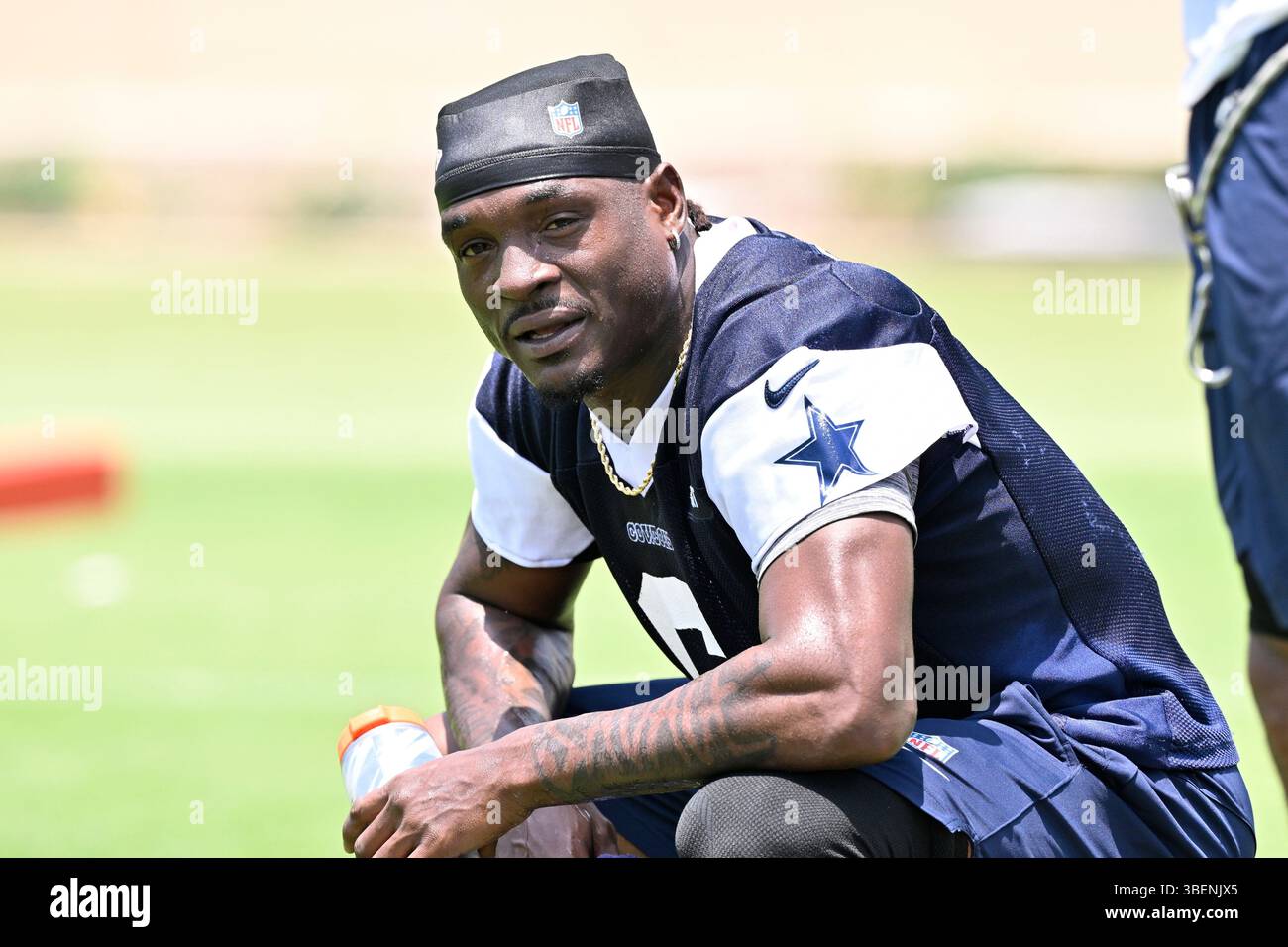 Dallas Cowboys safety Donovan Wilson takes a break on the sidelines ...