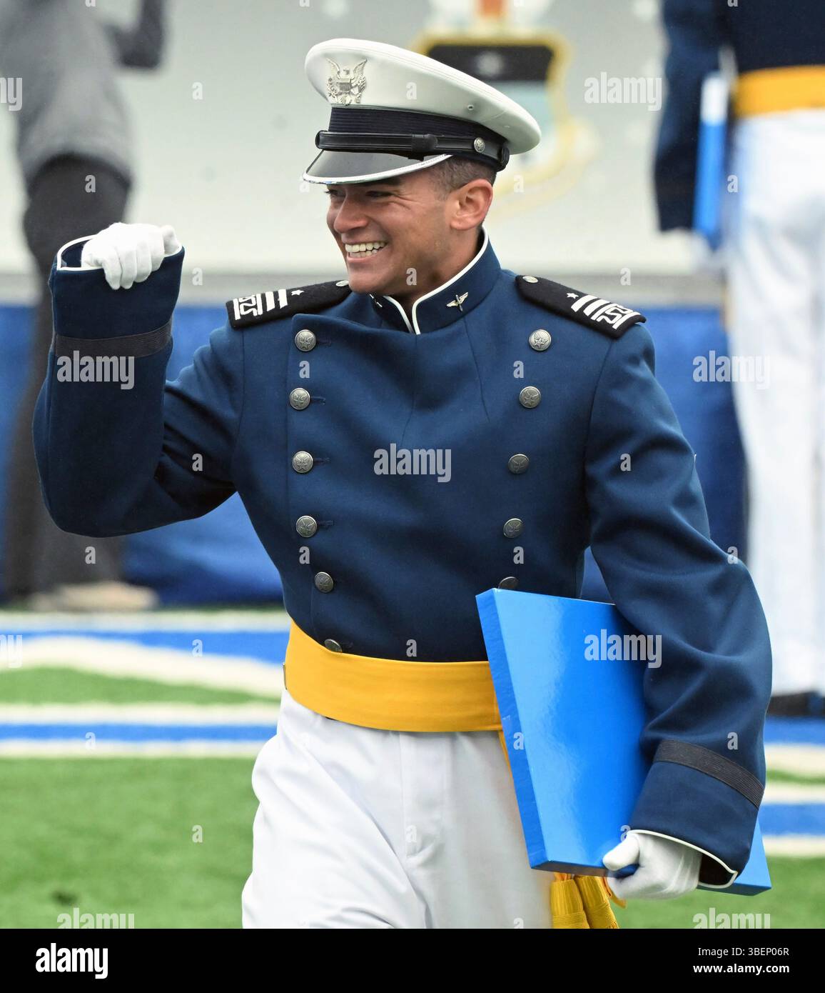 Graduating cadet Hunter Marquez pumps his fist after getting his ...