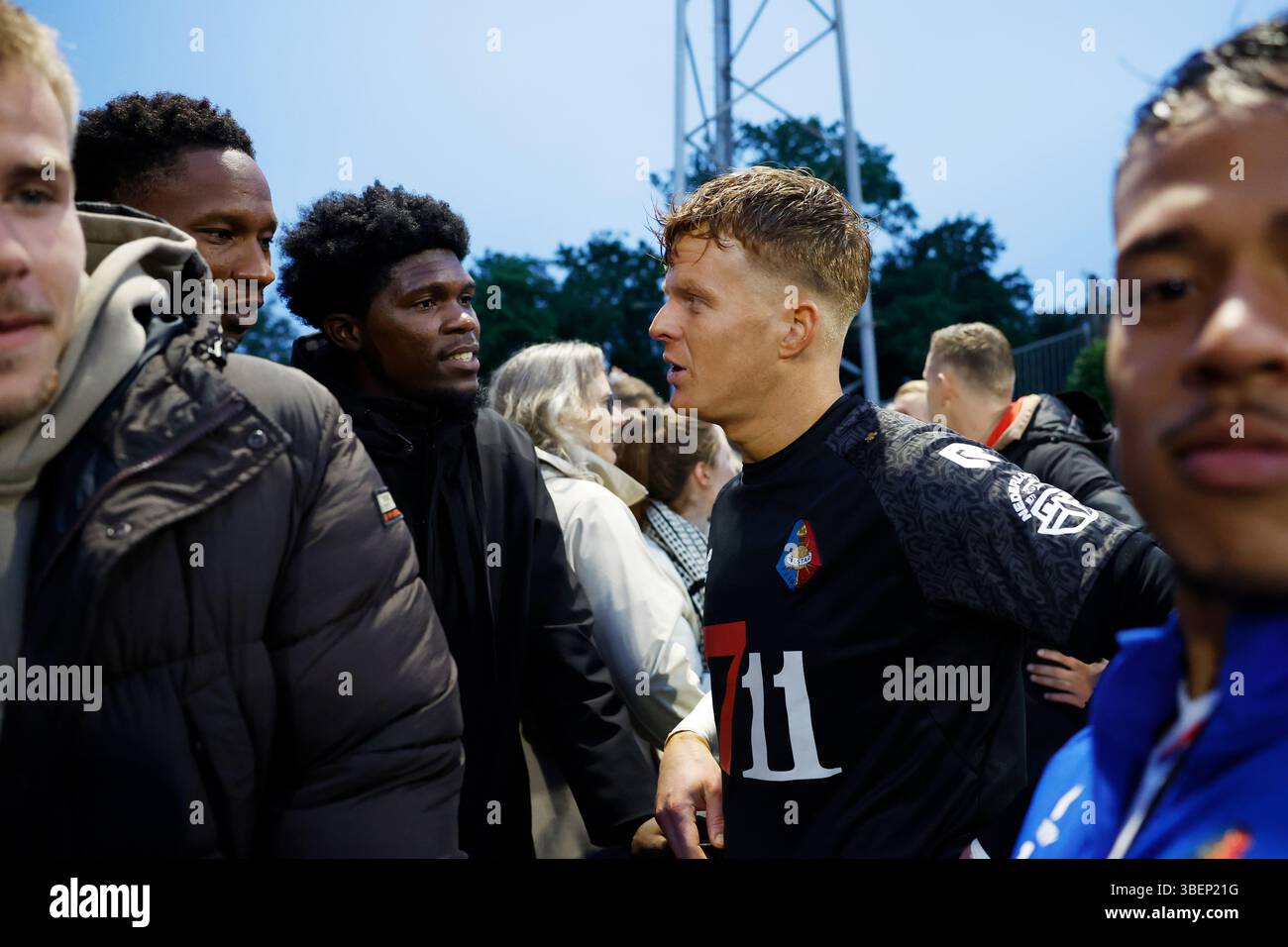 VELSEN - Telstar goalkeeper Ronald Koeman jr talks to friends after the ...