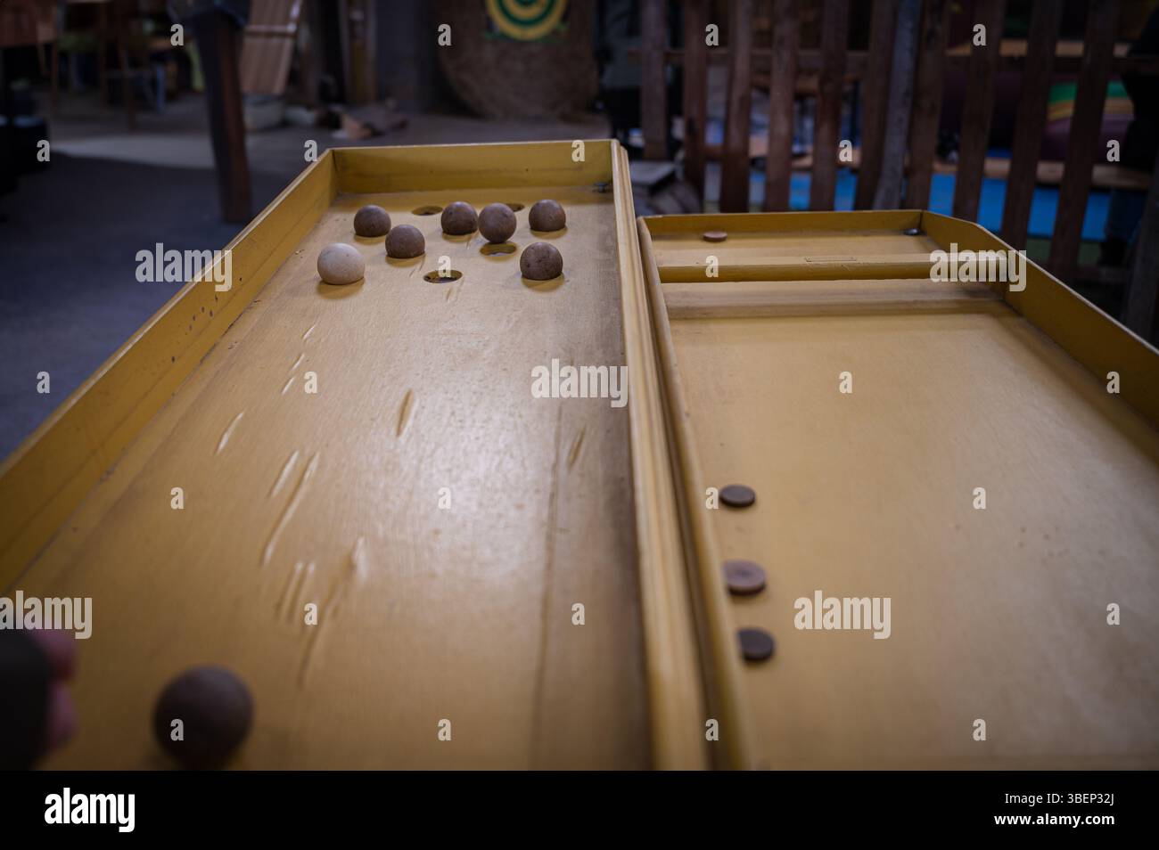 Vintage wooden sjoelbak game set up on farm Stock Photo - Alamy
