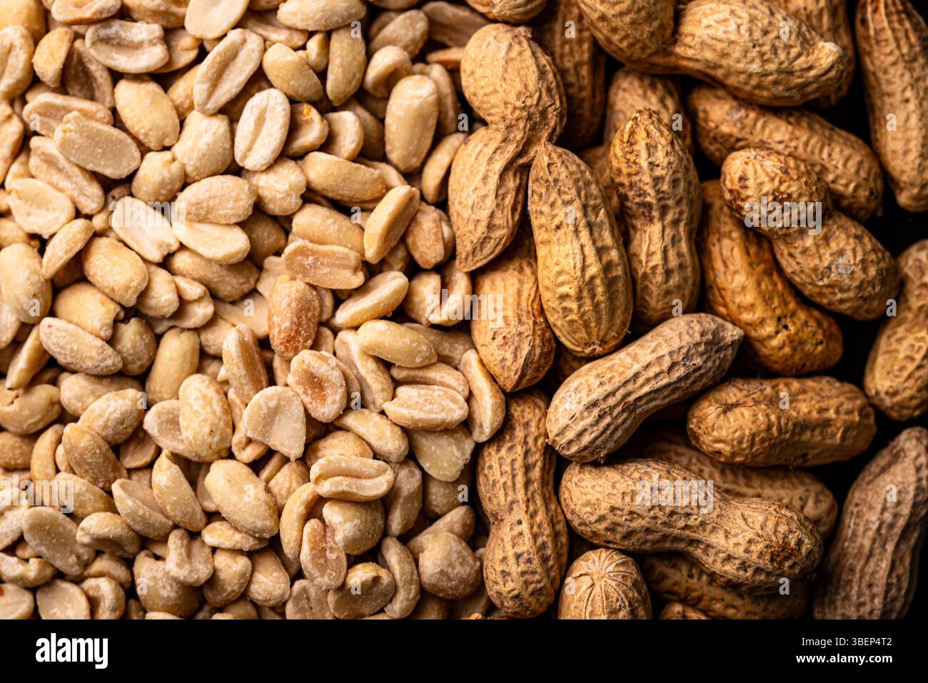 Raw and roasted peanuts texture comparison Stock Photo - Alamy