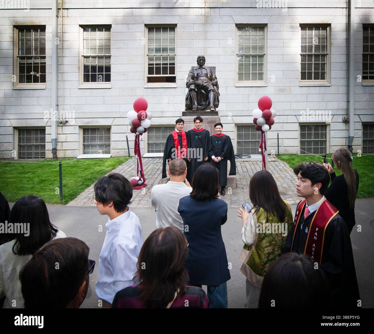 Harvard University, graduating Asian students pose for pictures in ...