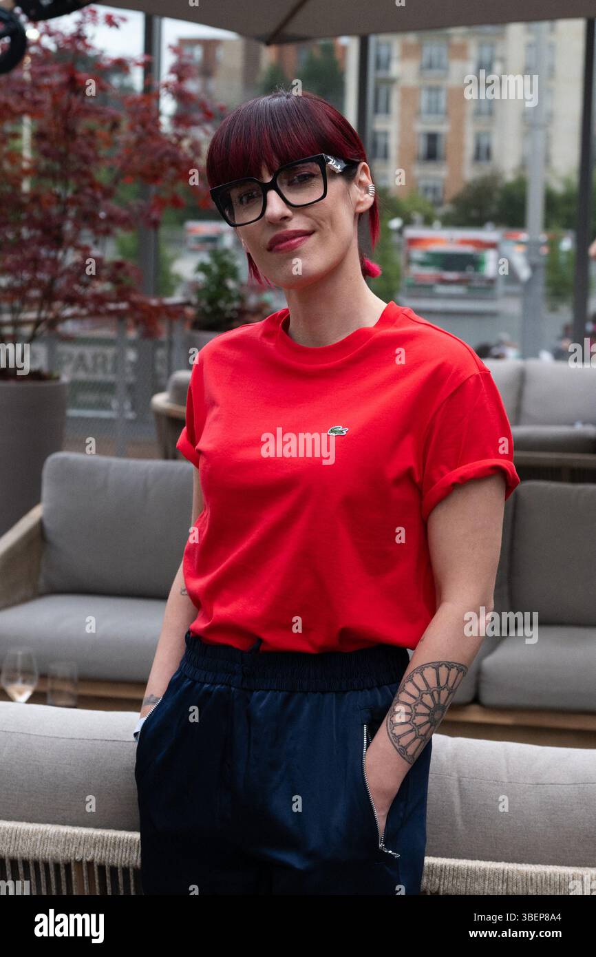 Jennifer Ayache take a pose at Roland Garros for the French open on May ...