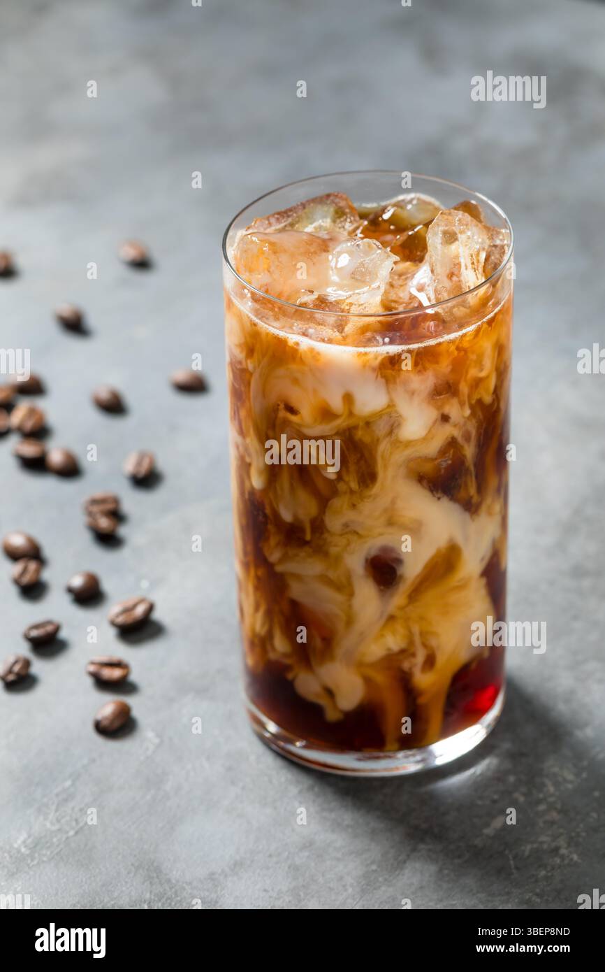 Homemade Cold Brew Iced Coffee with Oatmilk in a Glass Stock Photo - Alamy