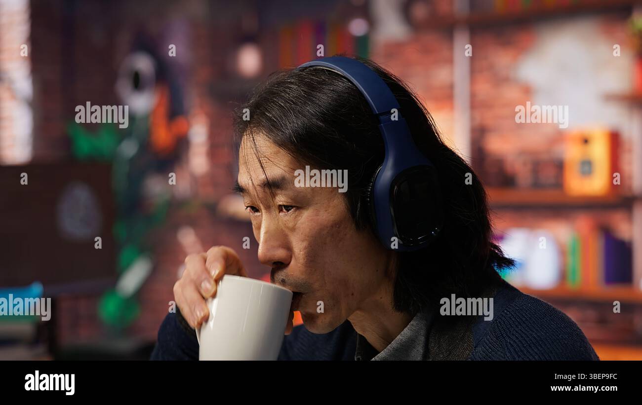 Focused engineer putting on headphones hi-res stock photography and images - Alamy