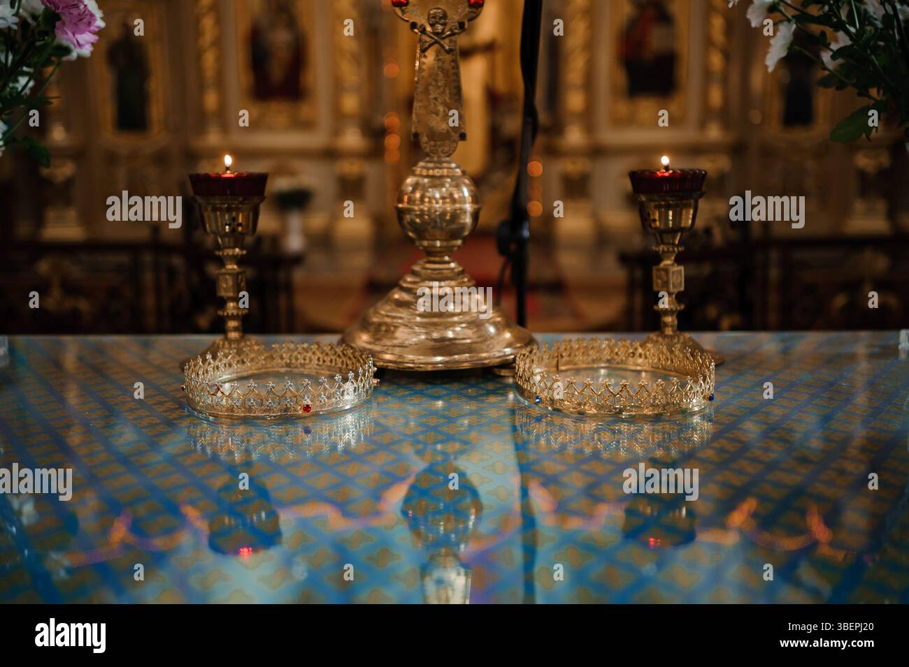 A serene indoor scene depicting a church altar adorned with golden ...
