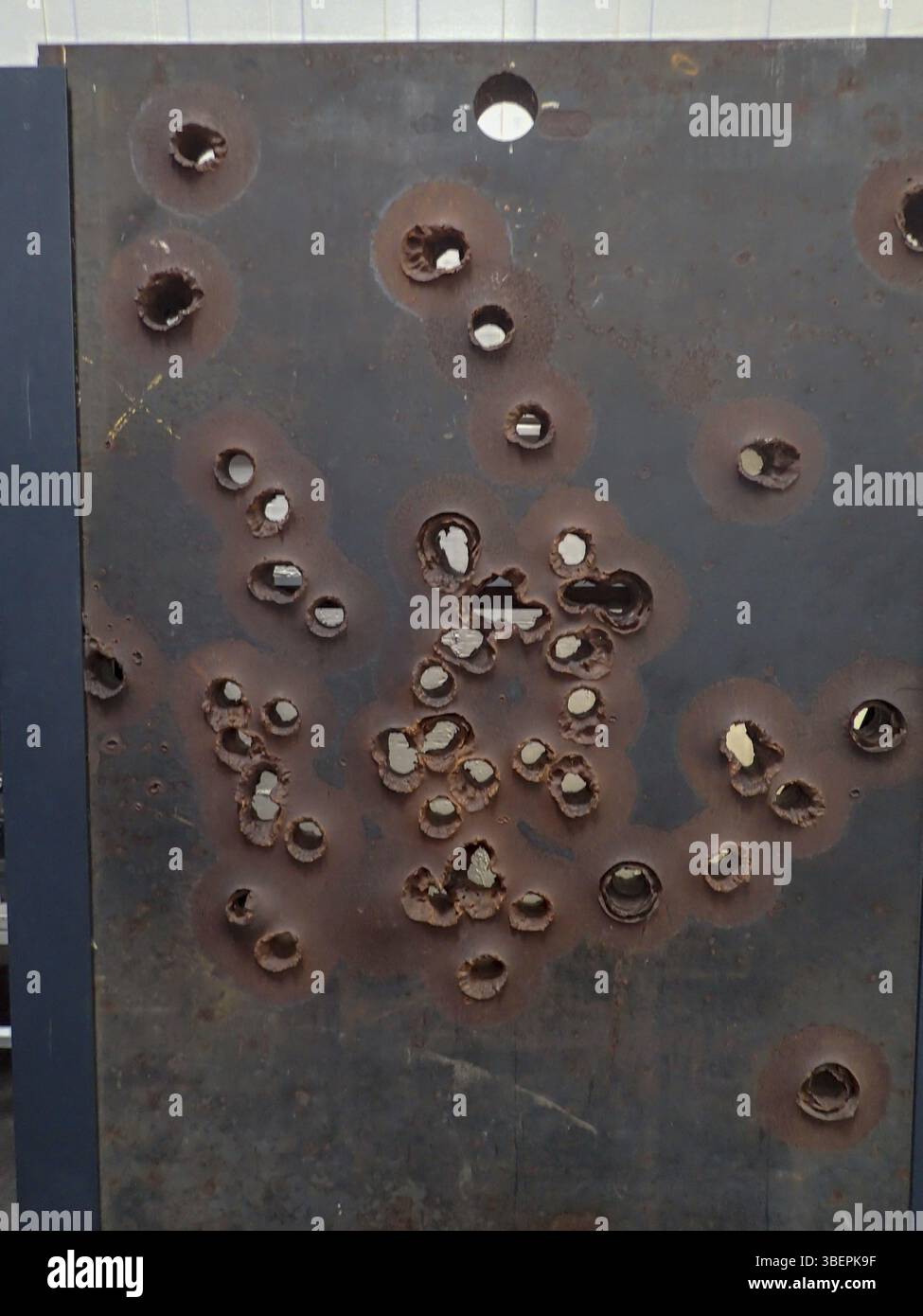 A steel with bullets holes Stock Photo - Alamy