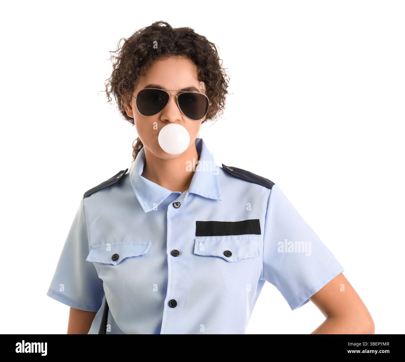 African-American female police officer blowing bubble gum on white ...