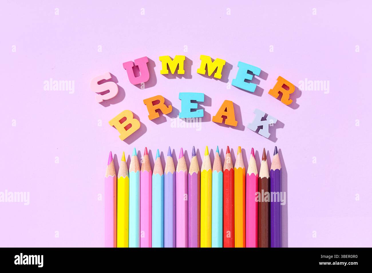 Composition with text SUMMER BREAK made of colorful letters and ...