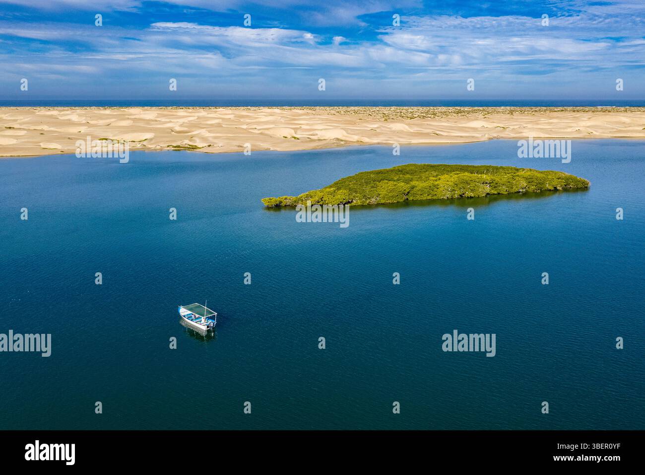 aerial view of mangrove island, boat and sand dunes, Magdalena Bay ...
