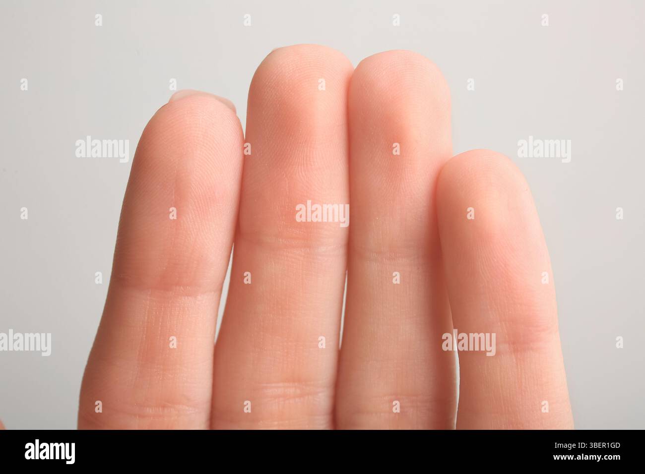 Human fingertips on grey background Stock Photo - Alamy