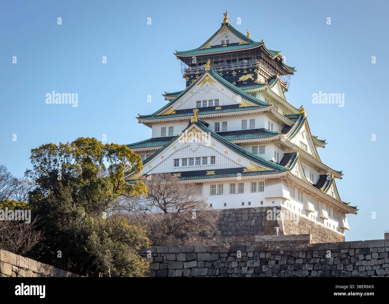 Green and white traditional Japanese architecture building of the Osaka ...