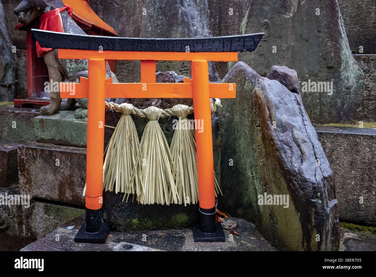 Small red torii gates prayer worship ornaments at the Fushimi Inari ...