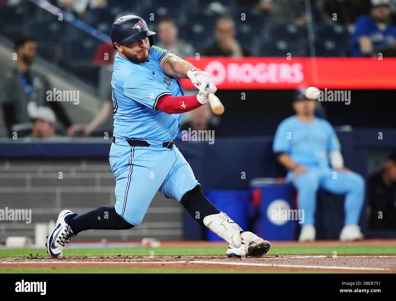 Toronto Blue Jays' Alejandro Kirk (30) hits a single against the ...