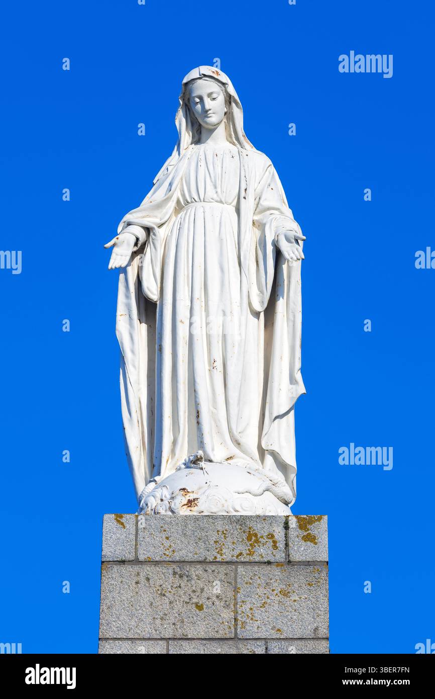 A statue of Mary, mother of Jesus at the D-Day 75 Garden in Arromanches ...