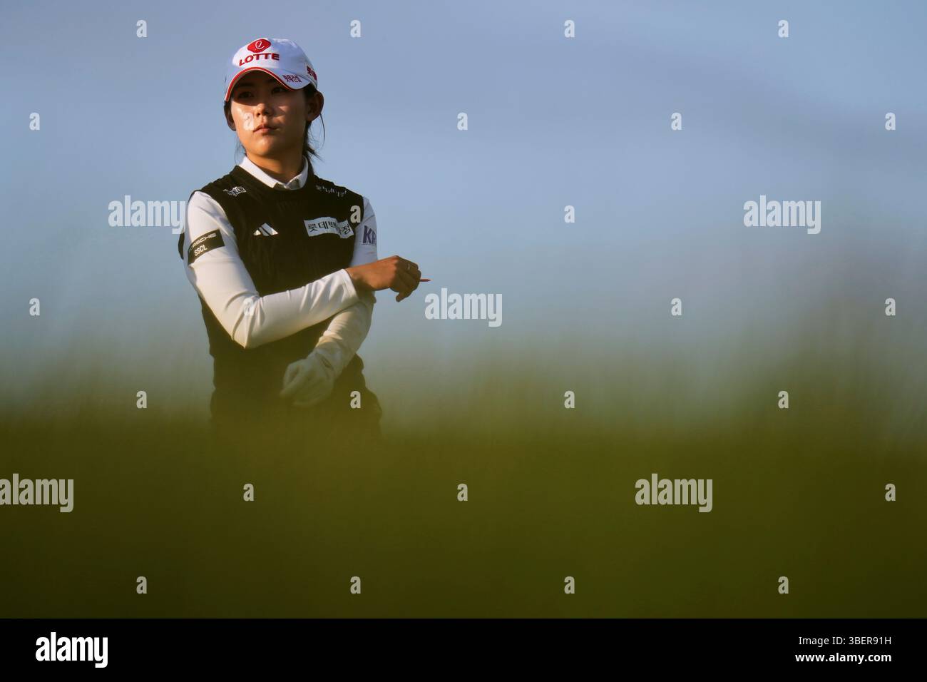 Youmin Hwang, of South Korea, waits to tee off on the ninth hole during ...