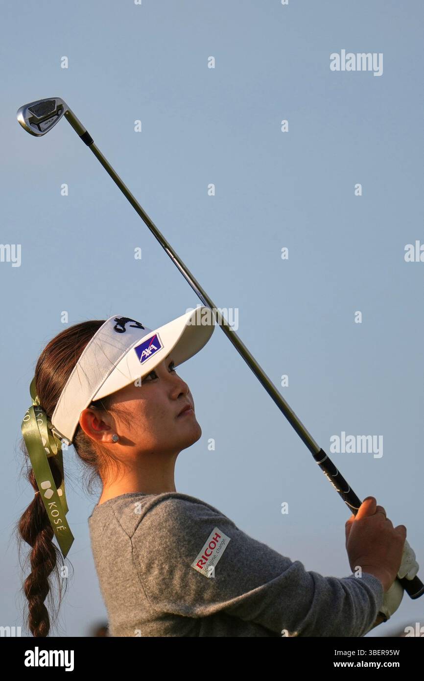 Yui Kawamoto, of Japan, hits from the ninth tee during the first round ...