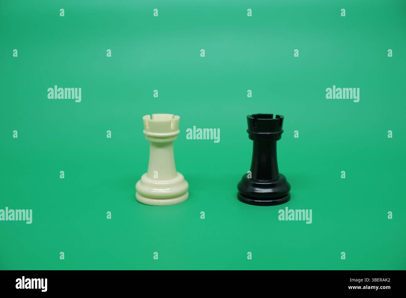 Black and white rook chess pieces. Has a straight motion and sometimes ...