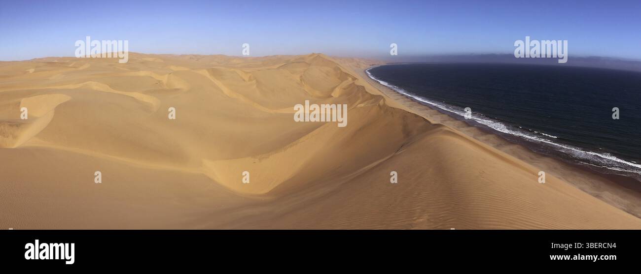 Sandwich Harbour, desert meets ocean Stock Photo - Alamy