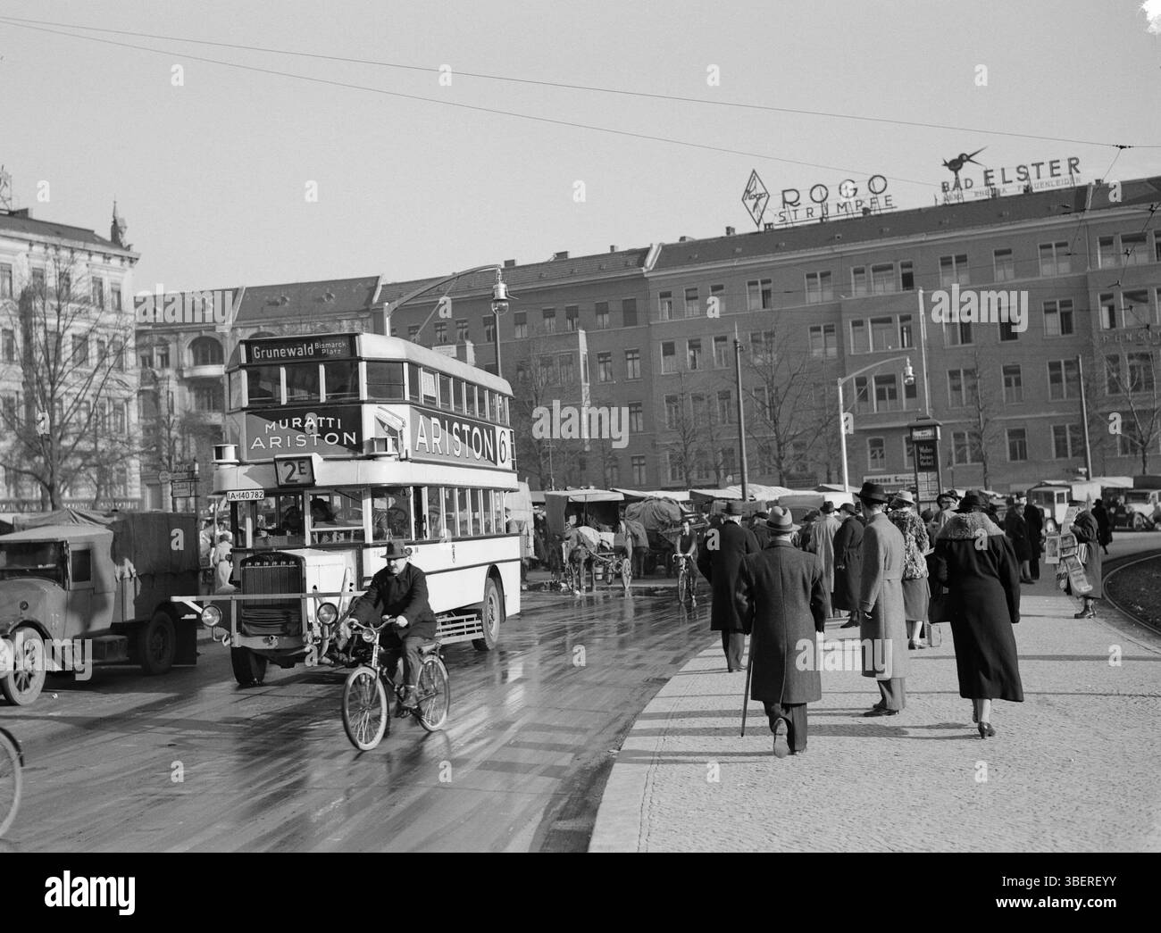1920s Berlin: Wittenbergplatz with market and traffic including a double-decker bus with ...